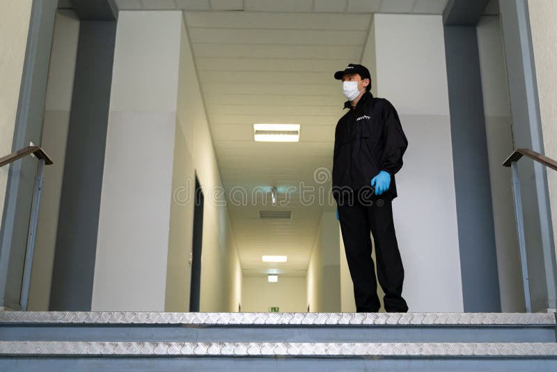Security Guard in Face Mask Stock Photo - Image of bodyguard, security ...