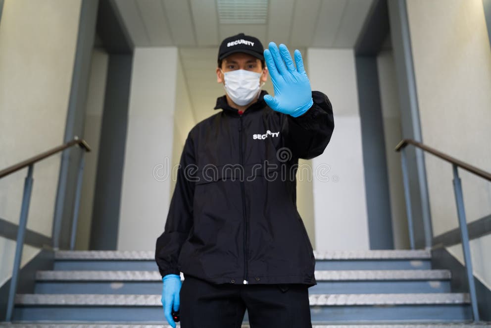 Security Guard in Face Mask Making Stop Gesture Stock Photo - Image of ...