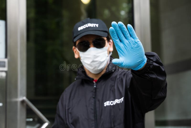 Security Guard in Face Mask Making Stop Hand Gesture Stock Image ...