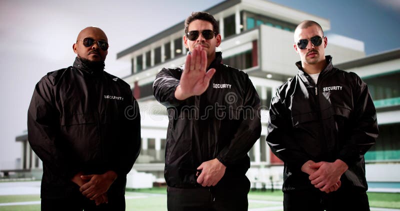 Security Guard Gives Stop Gesture in Front of Apartment Building Stock ...