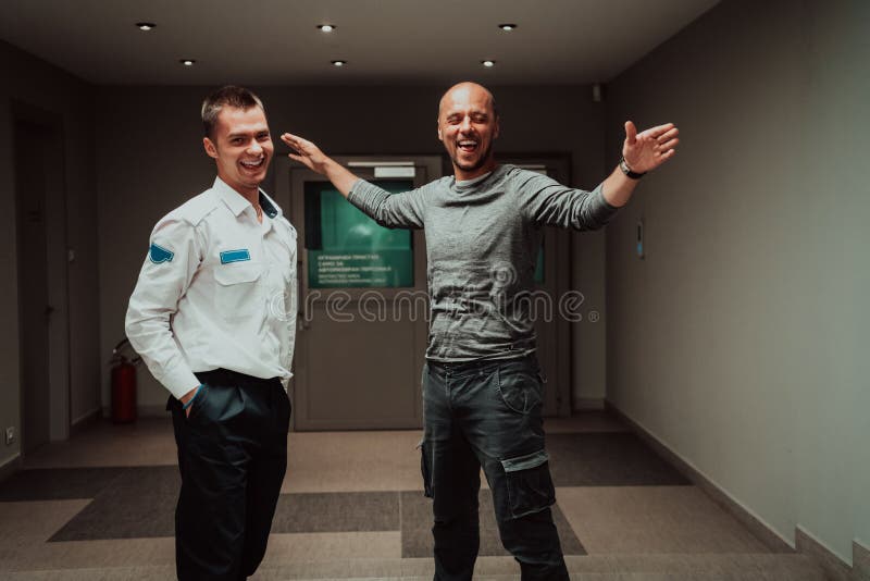 Security Guard Making Body Searching Procedure on Man for Finding ...