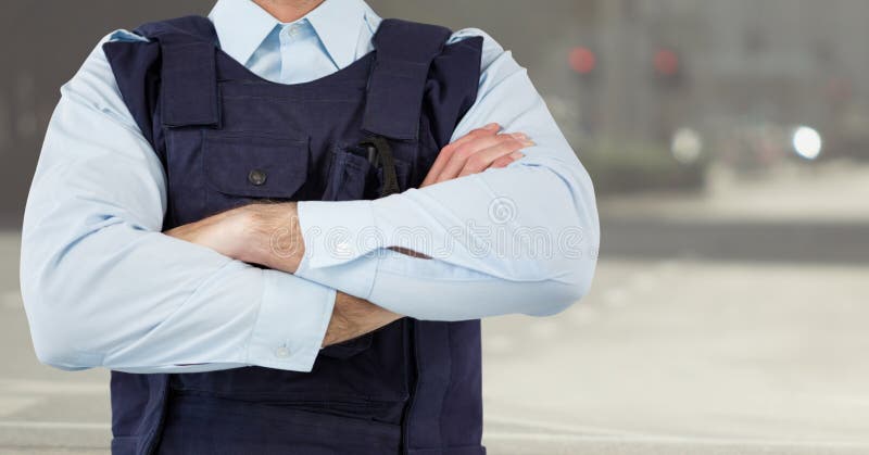 Security Guard Mid Section Arms Folded Against Blurry Street Stock ...