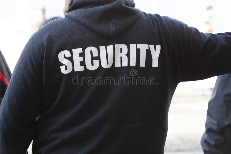 A Security Guard Officer at a Public Event Stock Photo - Image of ... A Security Guard Officer at a Public Event Stock Photo - Image of ...