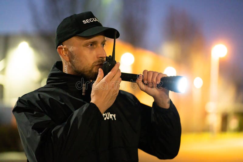 Security Guard Officer Using Walkie-Talkie Radio Stock Photo - Image of ...