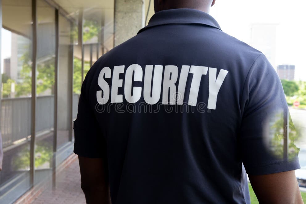 Security Guard Patrolling Office Building Stock Photo - Image of ...
