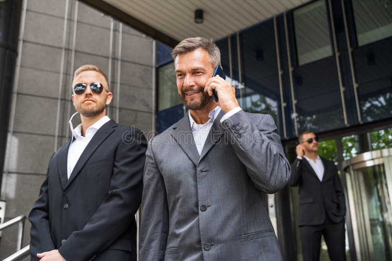 Security Guard Service Protecting Business Man Stock Photo - Image of ...