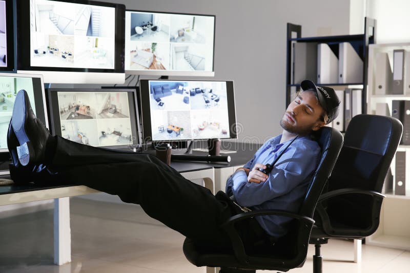 Security Guard Sleeping in Surveillance Room Stock Image - Image of ...