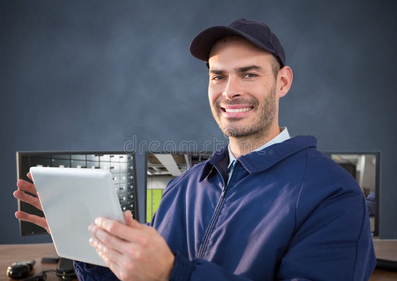 Security Guard Smiling in Front of the Computers with Tablet Stock ...