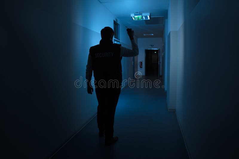 Security Guard Standing in Corridor of the Building Stock Photo - Image ...