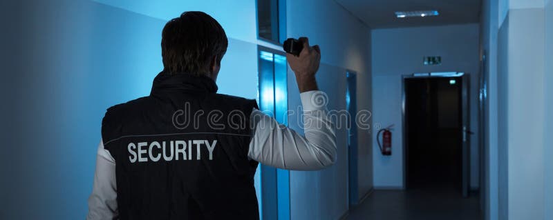 Security Guard Standing in Corridor of the Building Stock Image - Image ...