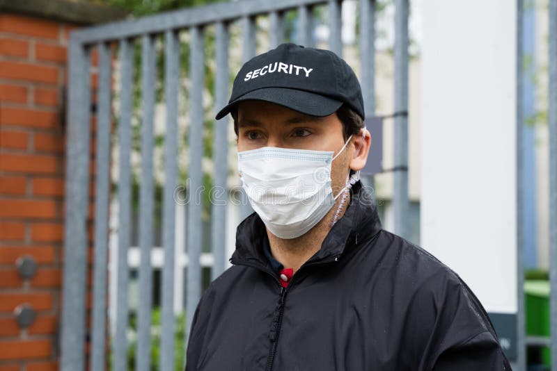 Security Guard Standing in Face Mask Stock Photo - Image of virus ...