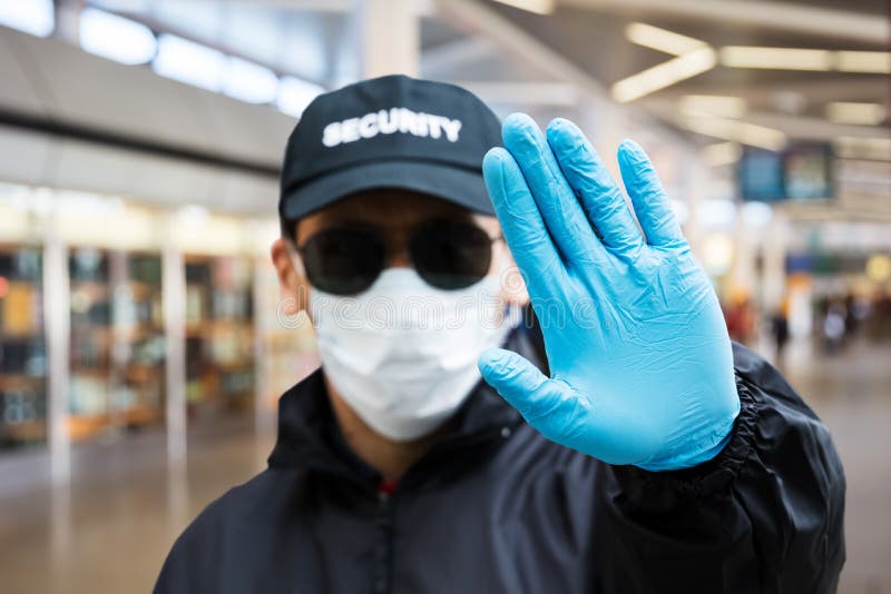 Security Guard Standing in Face Mask Stock Photo - Image of guards ...