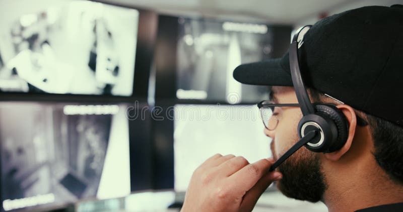 Security Guard, Surveillance and Microphone with Man in Control Room ...