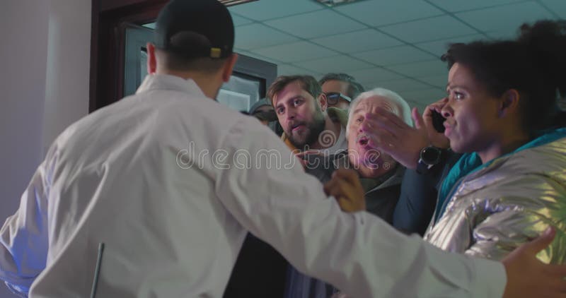 Security Guard Trying To Hold Crazy Crowd in Shop Entrance Stock Video ... Security Guard Trying To Hold Crazy Crowd in Shop Entrance Stock Video ...