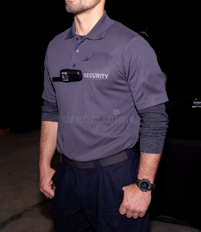 Security Guard in Uniform Patrolling in Commercial Mall Stock Image ...