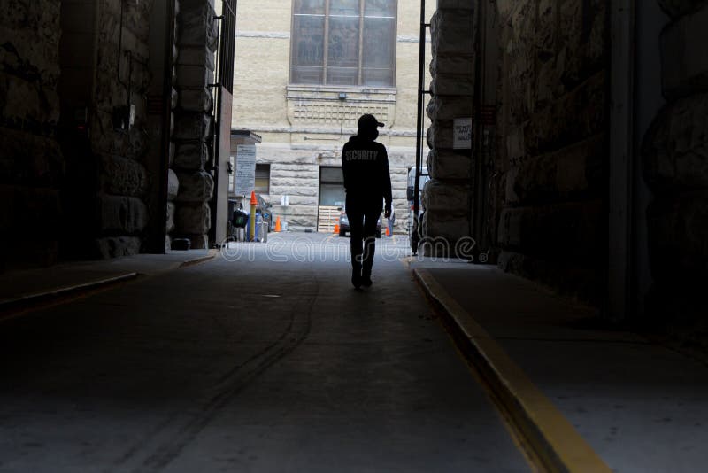 Security Guard in Uniform Patrolling Residential Area Stock Photo ...