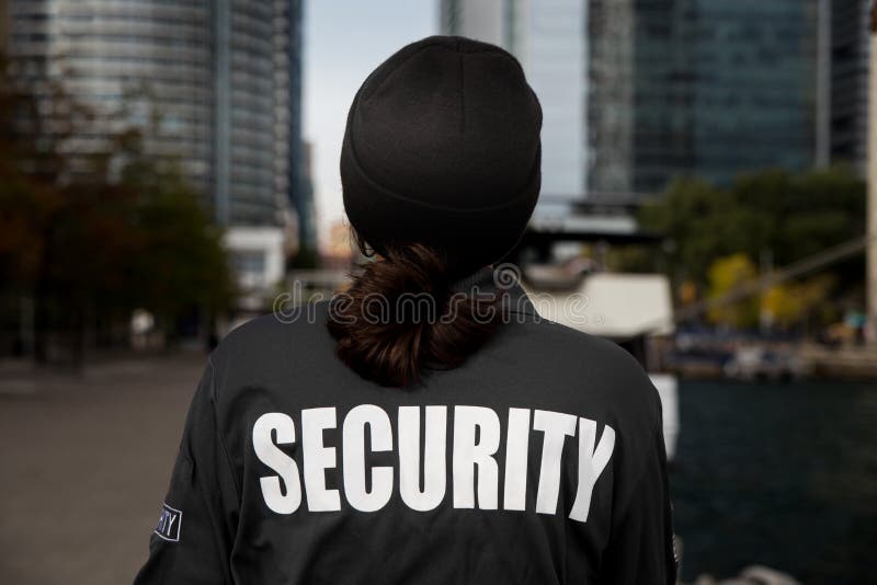 Security Guard in Uniform Patrolling Residential Area Stock Image ...