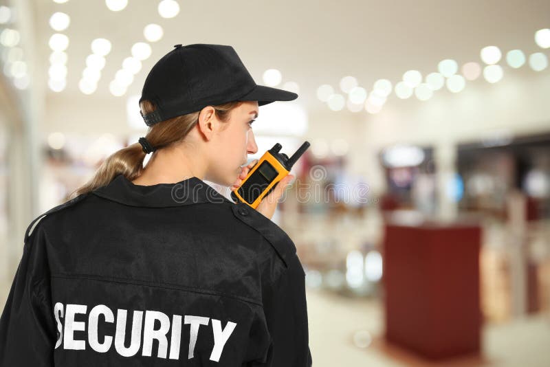 Security Guard Using Portable Radio Transmitter Shopping Mall Stock ...