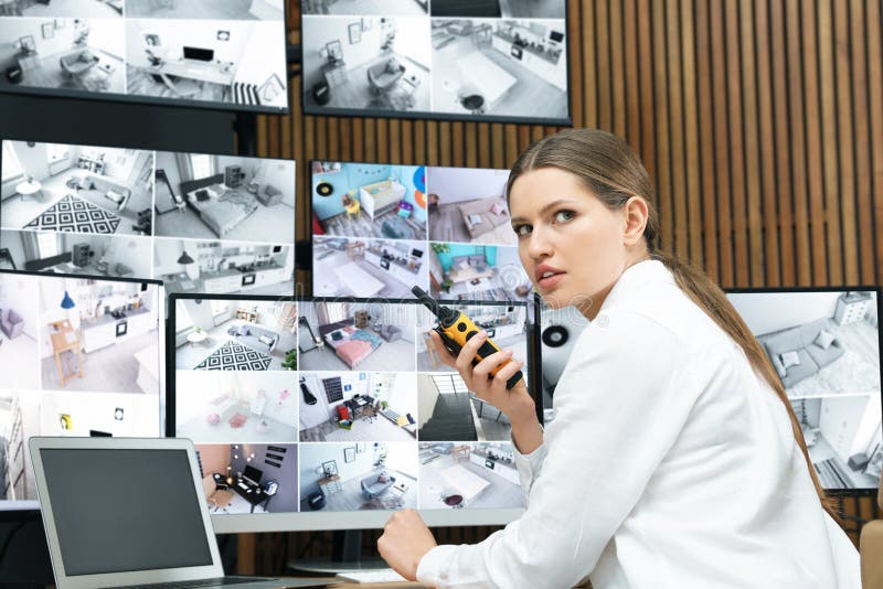 Security Guard Using Portable Transmitter at Workplace Stock Image ...