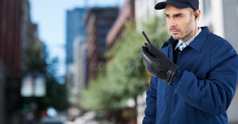 Security Guard with Walkie Talkie Against Blurry Street Stock Photo ...