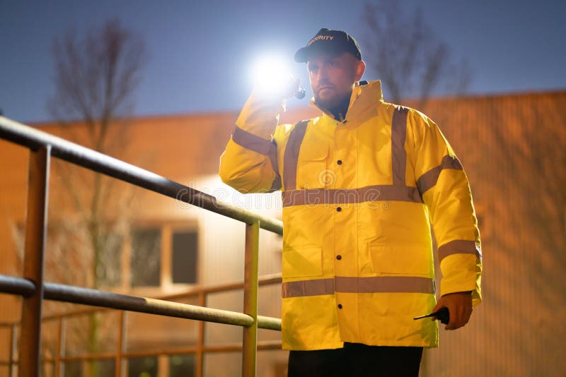 Security Guard Walking Building Perimeter with Flashlight Stock Photo ...