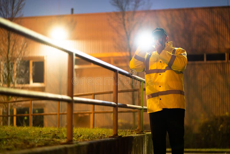 Security Guard Walking with Flashlight at Night Stock Photo - Image of ...