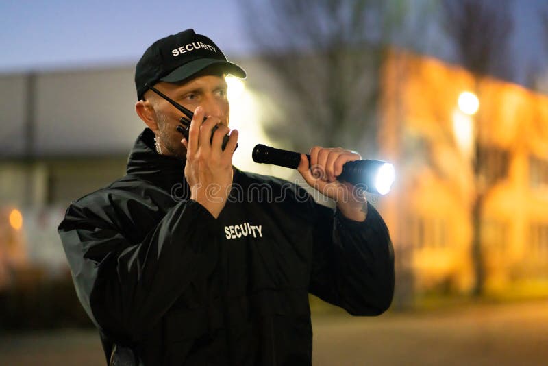 Security Guard Walking with Flashlight at Night Stock Photo - Image of ...