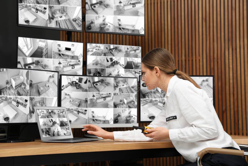 Security Guard Working with Laptop at Workplace Stock Image - Image of ...