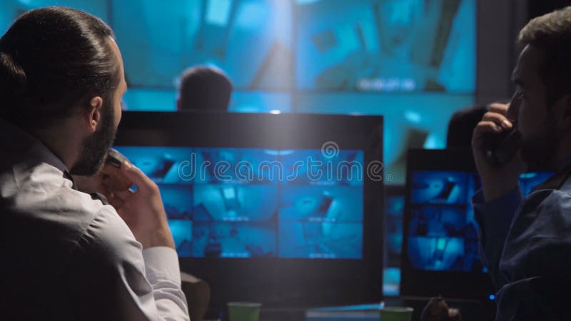 Security Guards Watching the Surveillance Cameras Stock Footage - Video ...