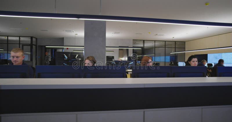 Security Guards Monitoring Modern CCTV Cameras in Surveillance Room ...
