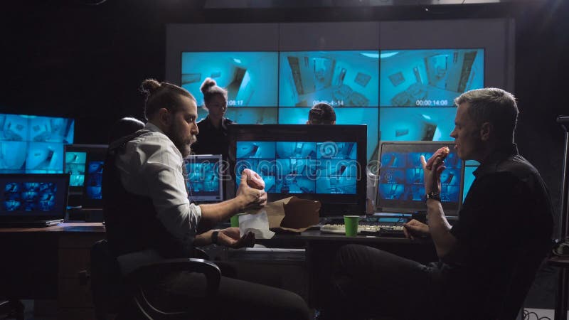 Security Guards Watching the Surveillance Cameras Stock Video - Video ...