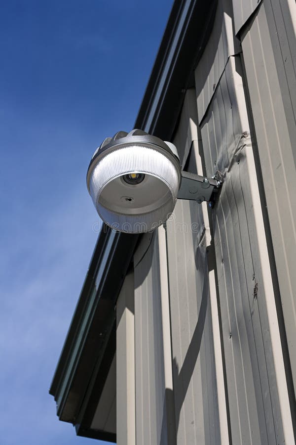 A Security Light on the Side of a Warehouse Stock Image - Image of ...