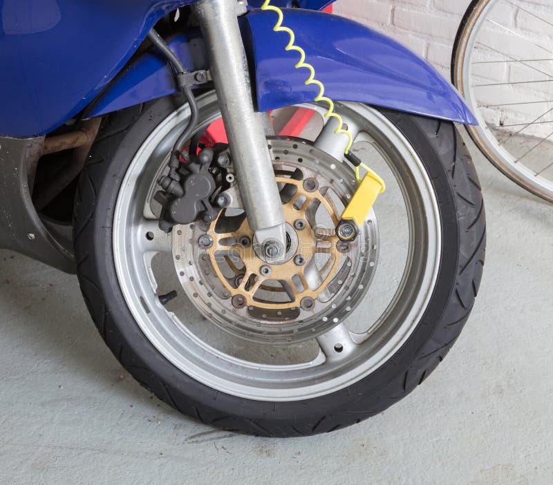 Security Lock Blocking the Motorcycle Wheel Stock Image - Image of ...