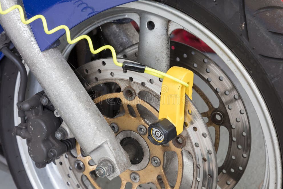 Security Lock Blocking the Motorcycle Wheel Stock Photo - Image of ...