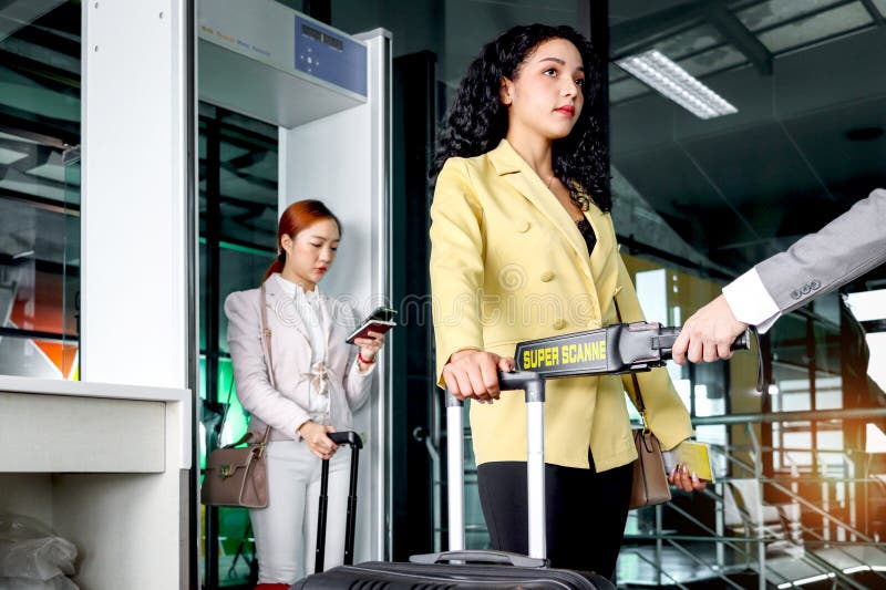 Security Man Holding Metal Weapon Detector Scanner for Checking Female ...