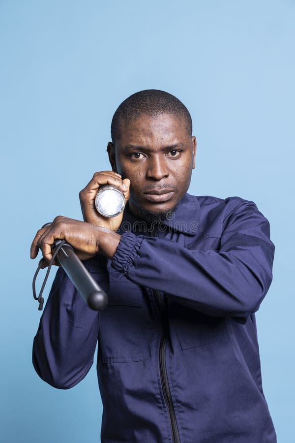 Security Officer Going on a Patrol in the Dark with His Flashlight ...