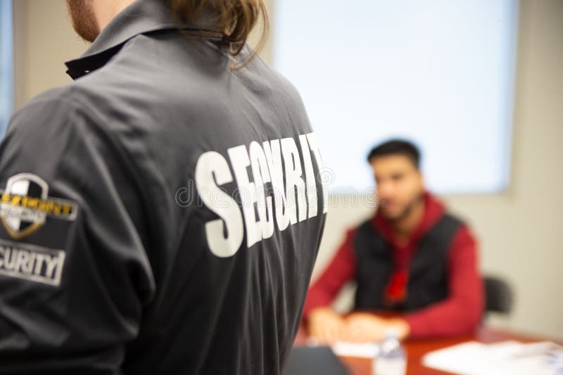 Security Officer Standing in a Conference Room Stock Image - Image of ...