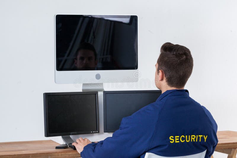 Security Officer Using Computer Stock Image - Image of personal, camera ...