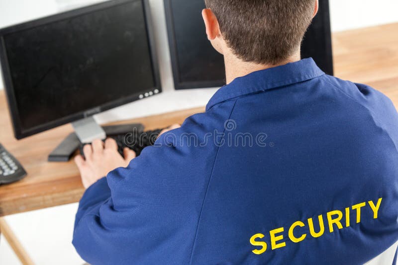 Security Officer Using Computer Stock Image - Image of officer, camera ...