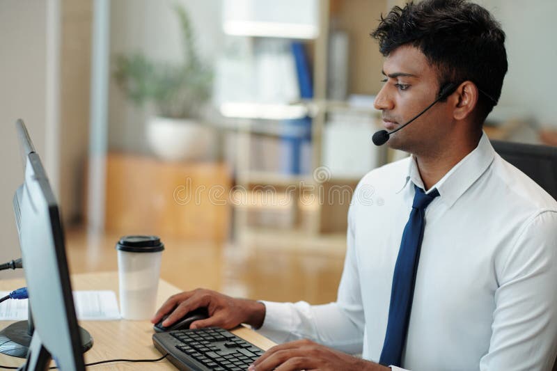 Security Officer Working at Desk Stock Image - Image of working ...