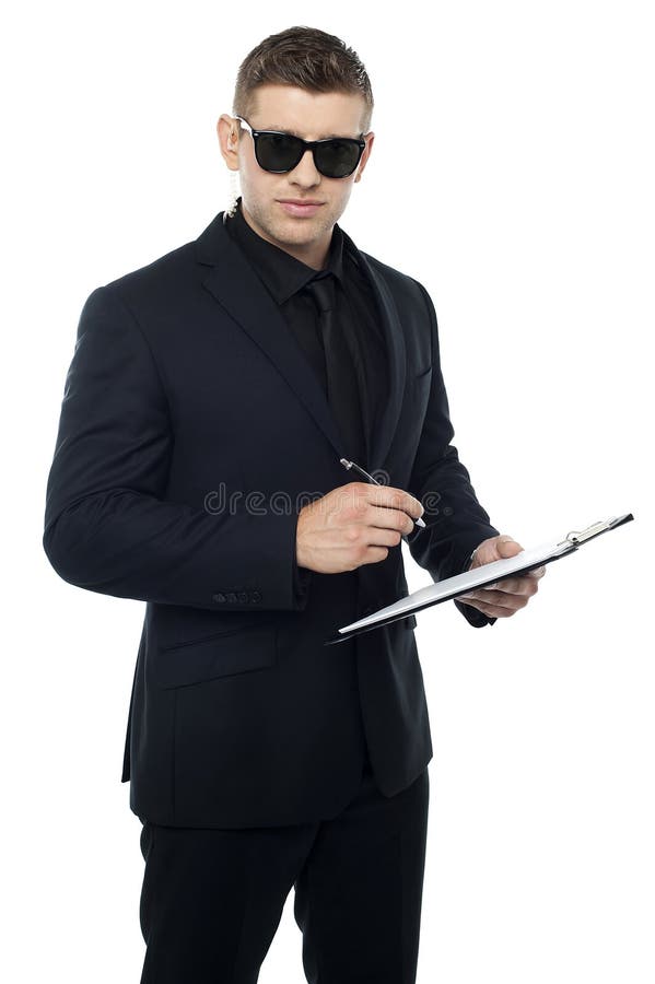 Security Officer Writing on Clipboard Stock Image - Image of ...