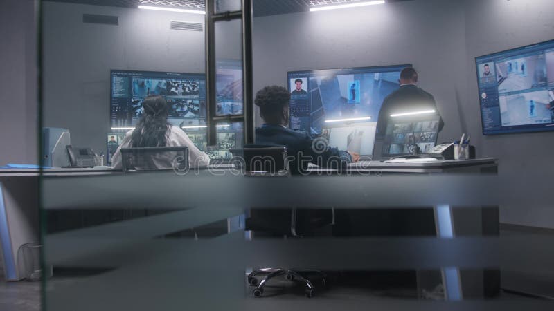 Multi Ethnic Officers and Operators Control CCTV Cameras Stock Video ...