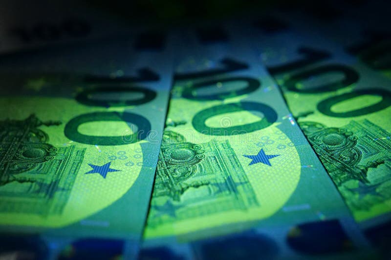 Security Signs and Elements on Euro Banknotes Glow Under Ultraviolet ...