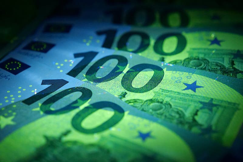 Security Signs and Elements on Euro Banknotes Glow Under Ultraviolet ...