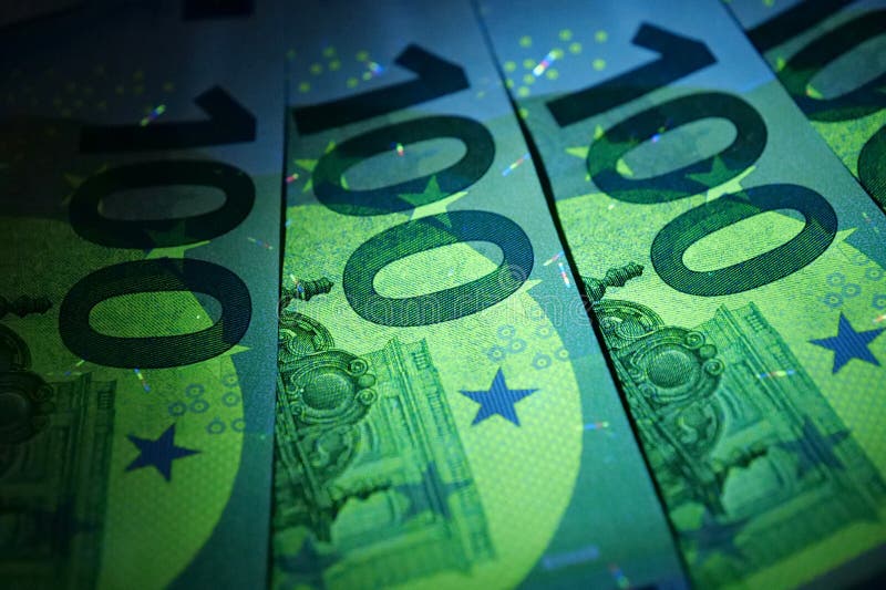 Security Signs and Elements on Euro Banknotes Glow Under Ultraviolet ...