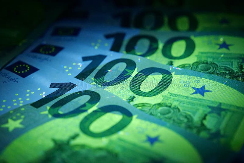Security Signs and Elements on Euro Banknotes Glow Under Ultraviolet ...
