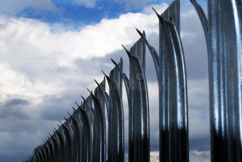 Security Steel Fence with Sharp Top Section. Stock Photo - Image of ...