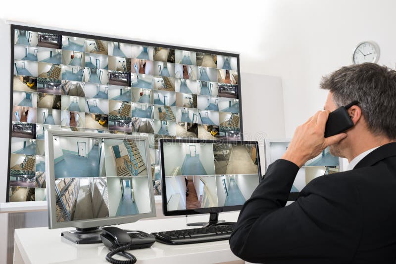 Security System Operator Looking at Cctv Footage Stock Image - Image of ...