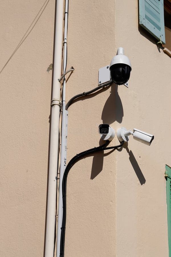 Security Three Cctv and Round Camera on Facade Wall Building Stock ...