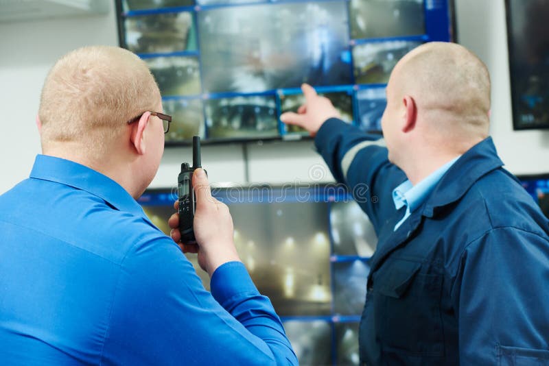 Security Worker during Monitoring. Video Surveillance System. Stock ... Security Worker during Monitoring. Video Surveillance System. Stock ...